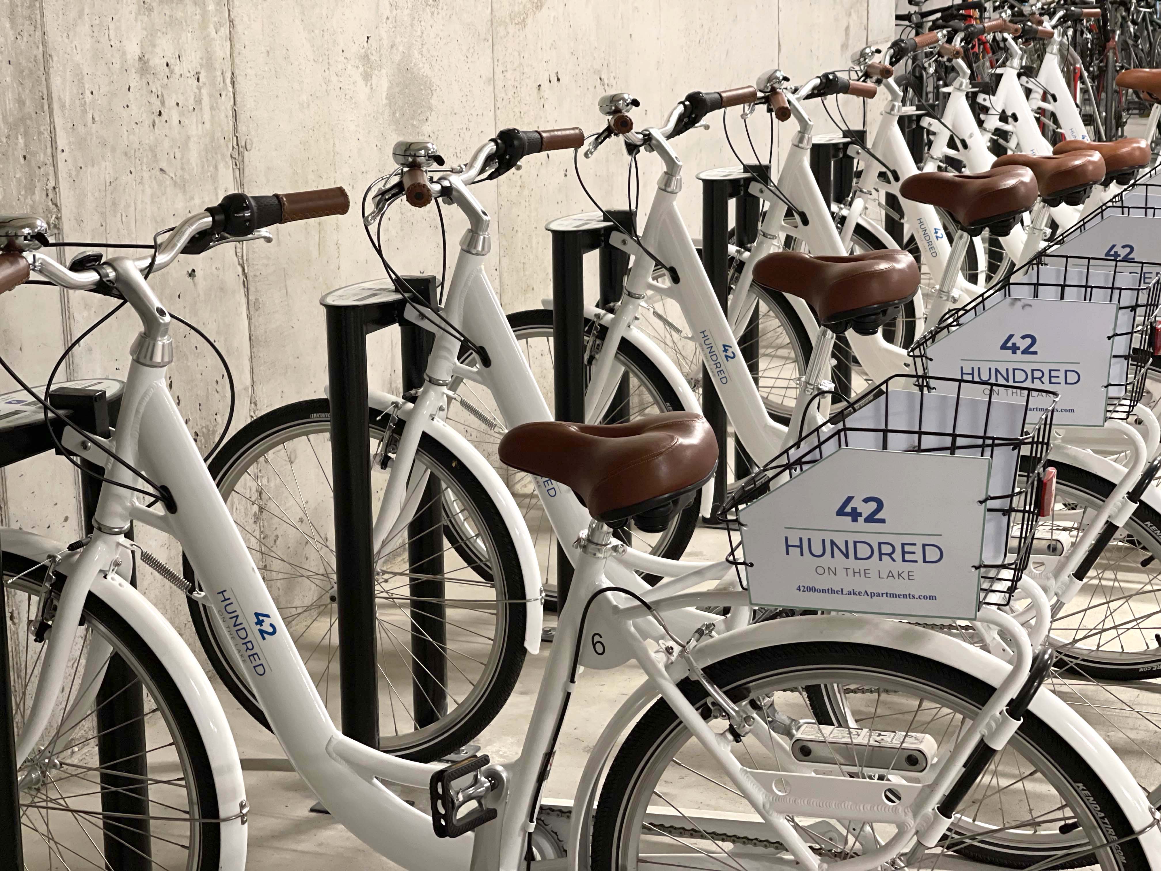 Bike Shares, E-Bikes Gain Speed as Amenity